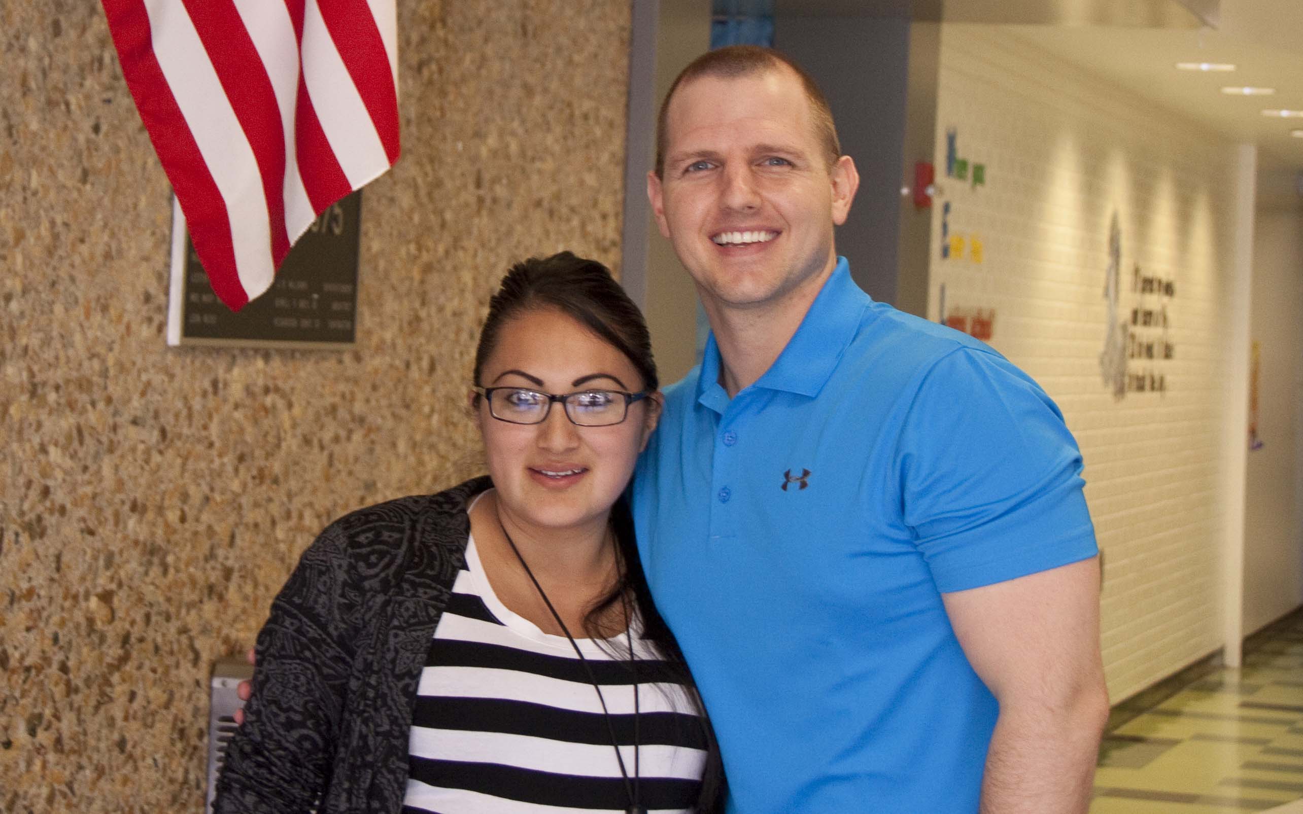 Theresa Villeda, instructional aide, stands with Jonathan Crossley in ...